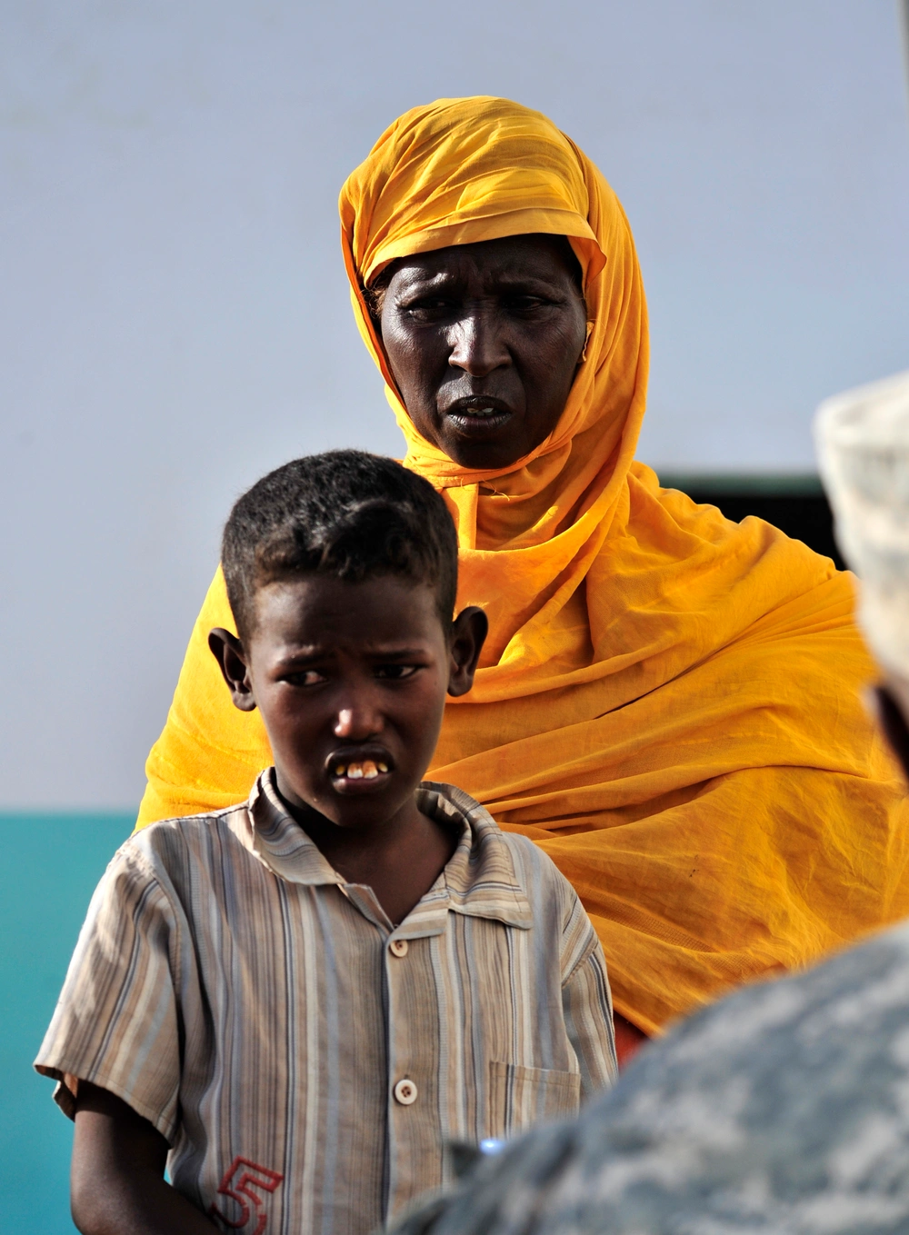 DVIDS - Images - A Boy Waits in Line for Medication During a During a ...