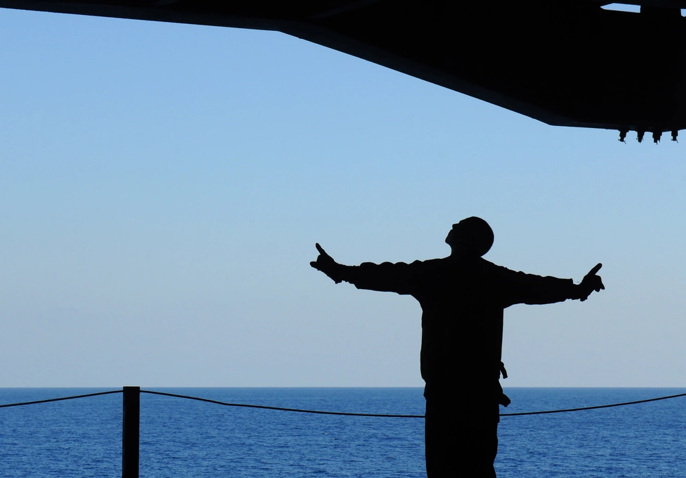 DVIDS - Images - Signaling an aircraft elevator [Image 2 of 5]