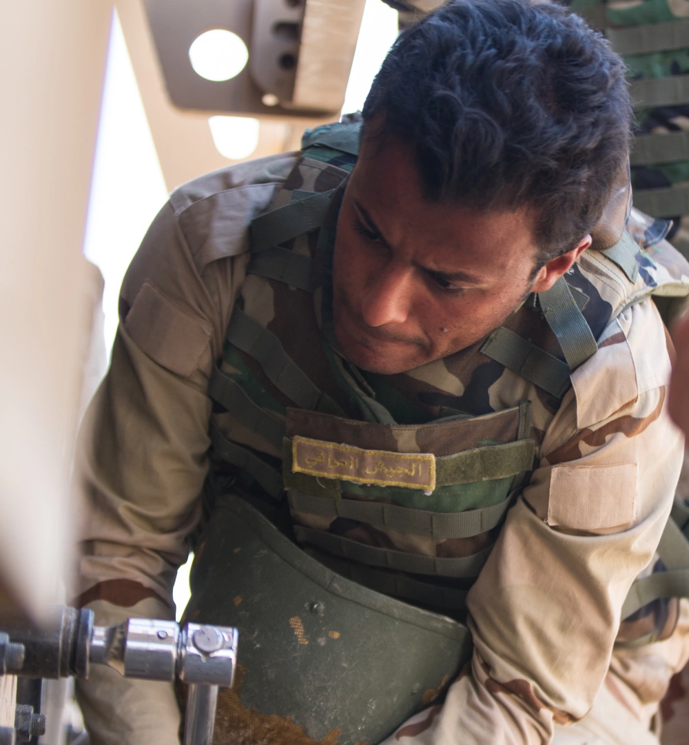 DVIDS - Images - Iraqi soldier changes tire in competition [Image 5 of 7]