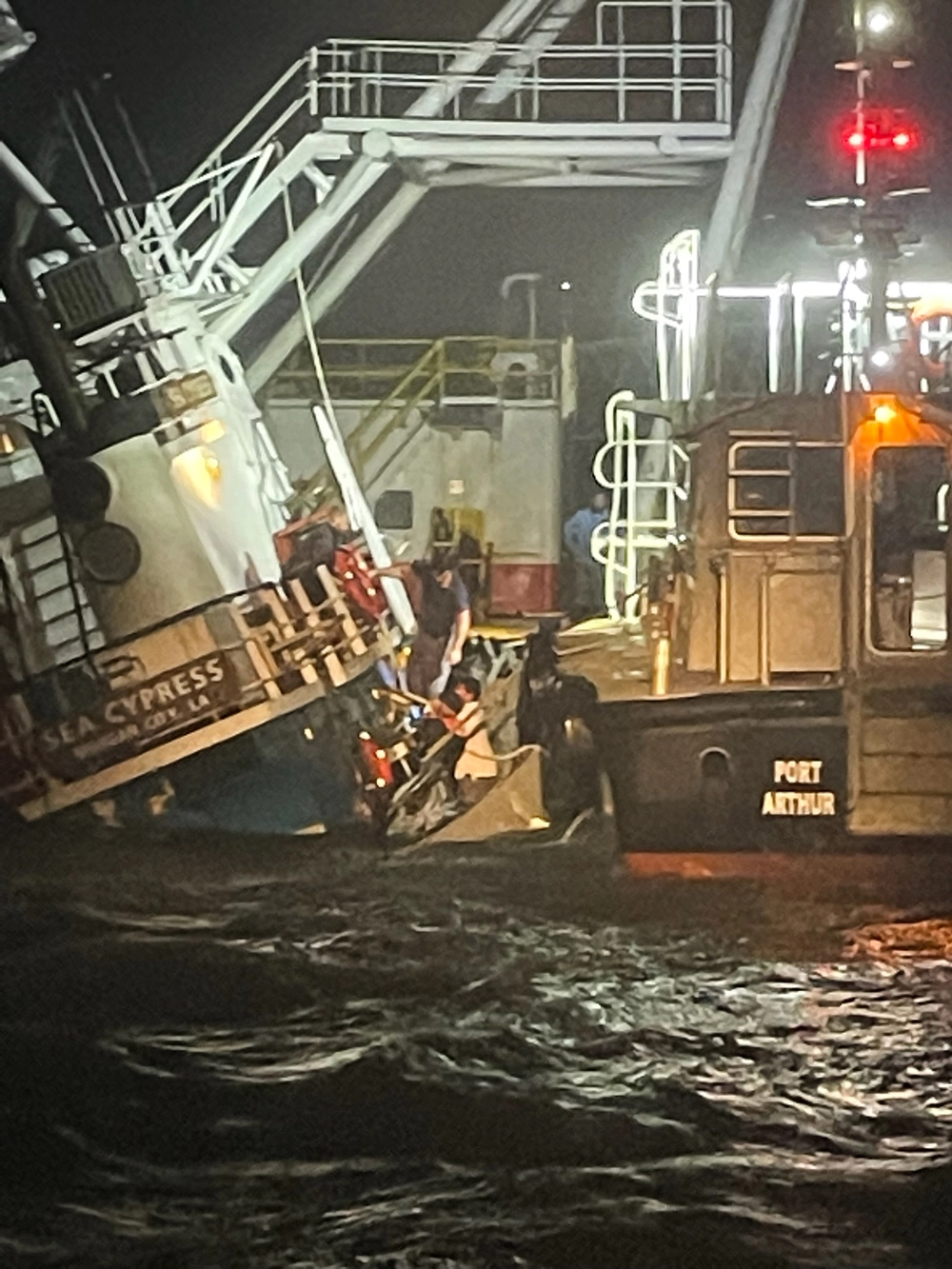 DVIDS - Images - Strong enough: Coast Guardsman frees 2 trapped in ...