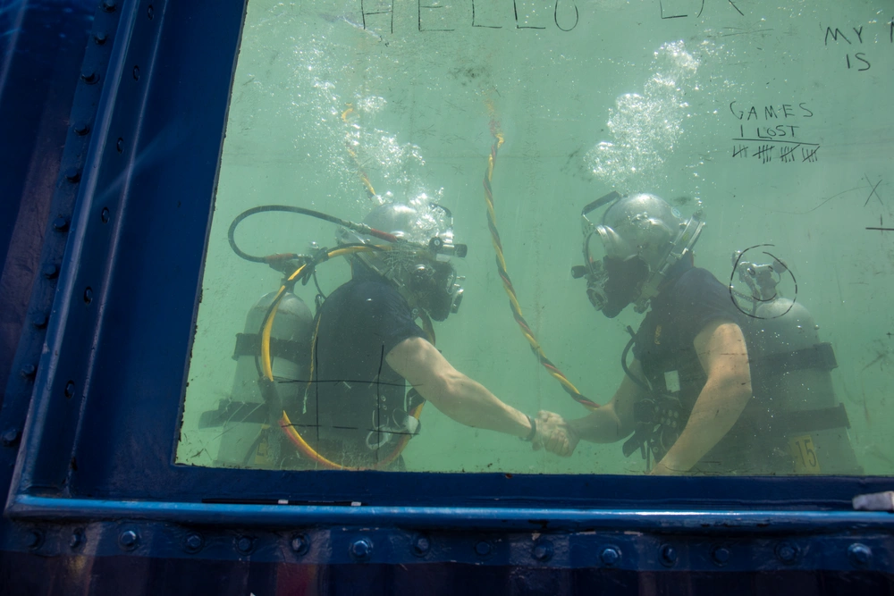 DVIDS - Images - EA2 Baker Reenlists Underwater During Fleet Week 2025 ...