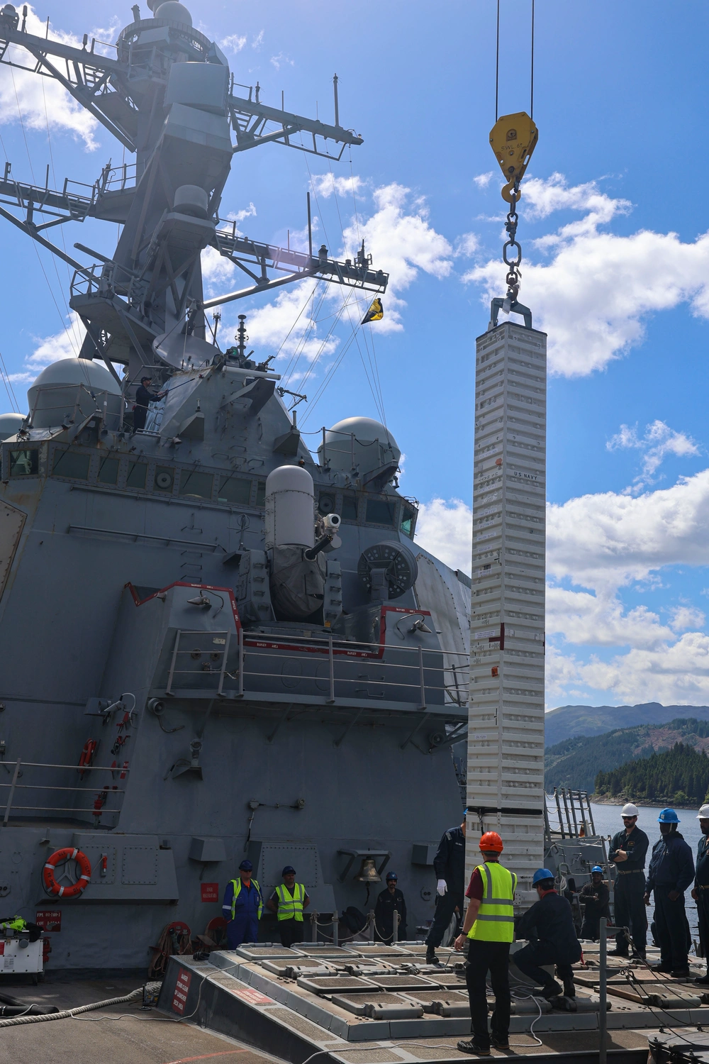 DVIDS - Images - Sailors and contractors coordinate the reloading of a ...