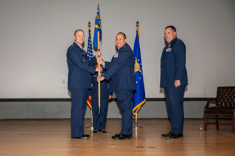 DVIDS - Images - Lt. Col. James Denny, incoming 377th Comptroller Squadron commander, receives ...