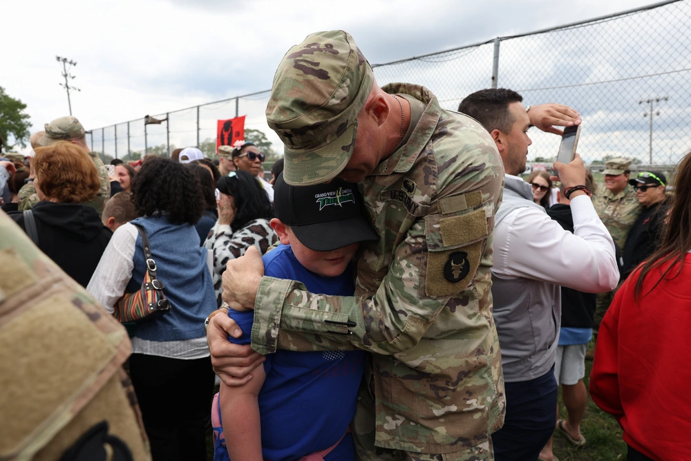 DVIDS - Images - Red Bull Soldier shares a moment before deployment ...