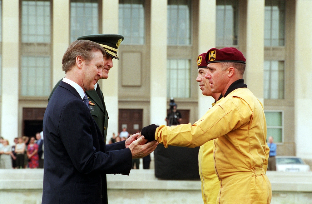 DVIDS - Images - Secretary Cohen and Gen. Shelton receive batons from ...