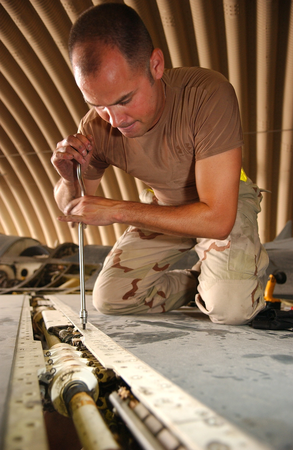 DVIDS - Images - Air Force Tech. Sgt. Edwin Rosado replaces a screw ...