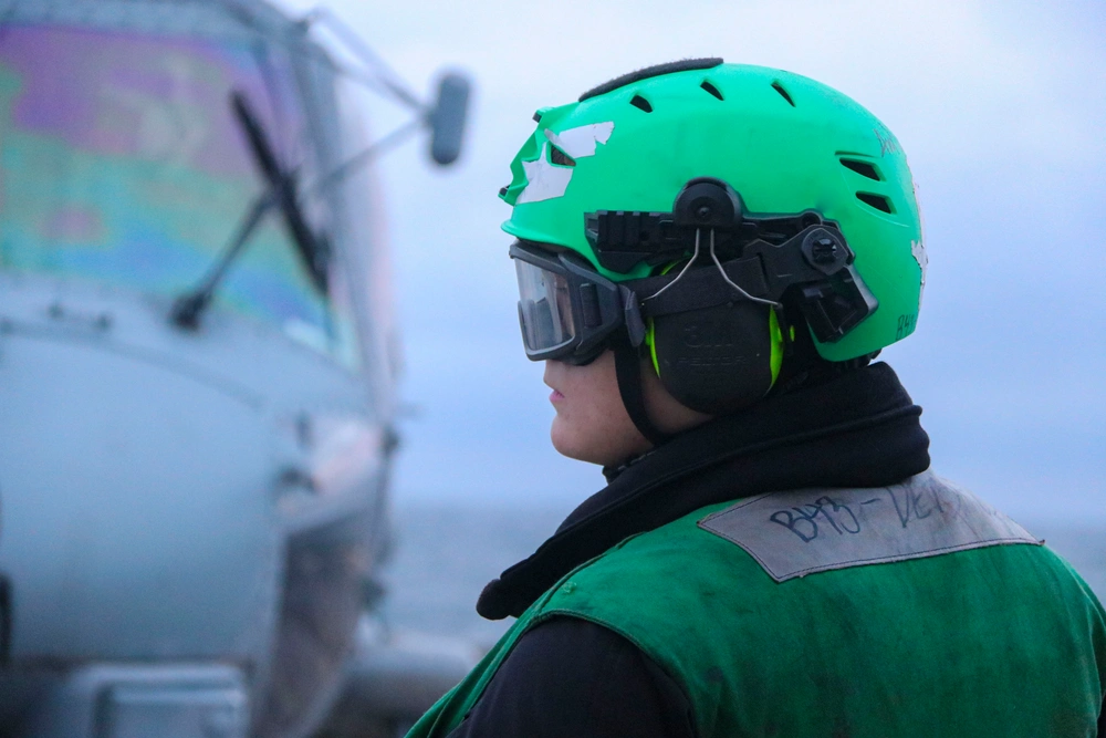 DVIDS - Images - AM2 Caroline Woolley signals to pilots aboard a MH-60R ...
