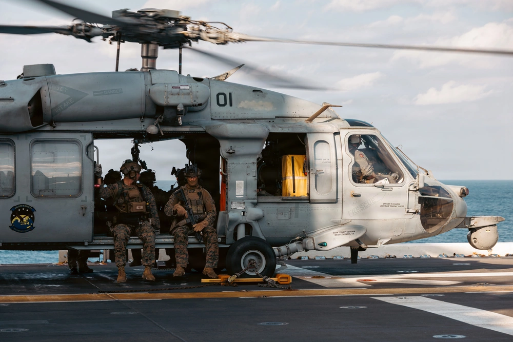 DVIDS - Images - 31st MEU | MRF Fast Ropes aboard USS Tripoli