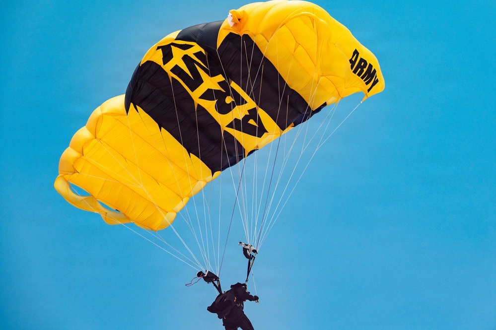 DVIDS - Images - U.S. Army Golden Knights parachutist descends under ...